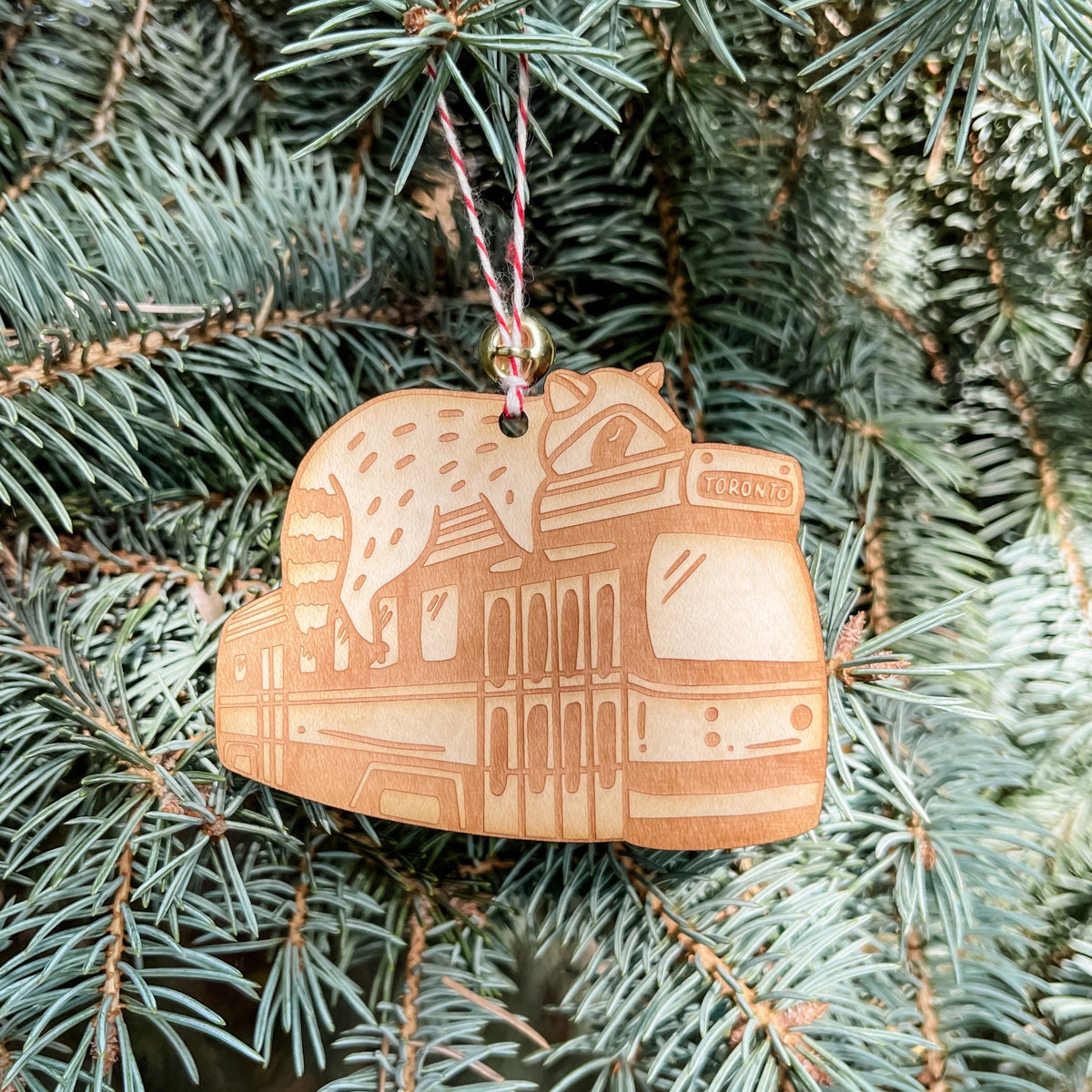 Toronto Raccoon Streetcar Wood Ornament | Crywolf – Outer Layer